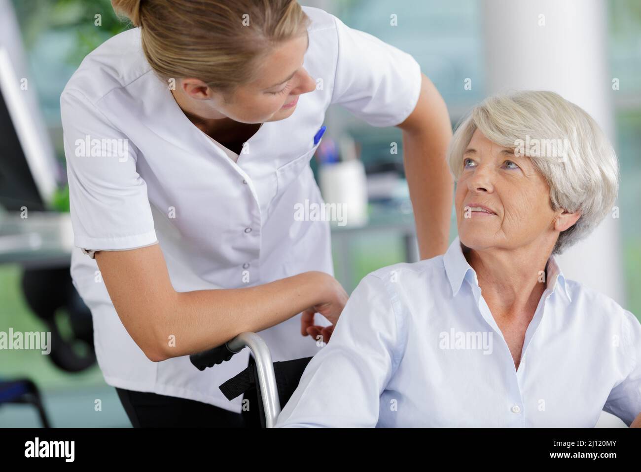 senior woman having assistance of a loving nurse Stock Photo - Alamy