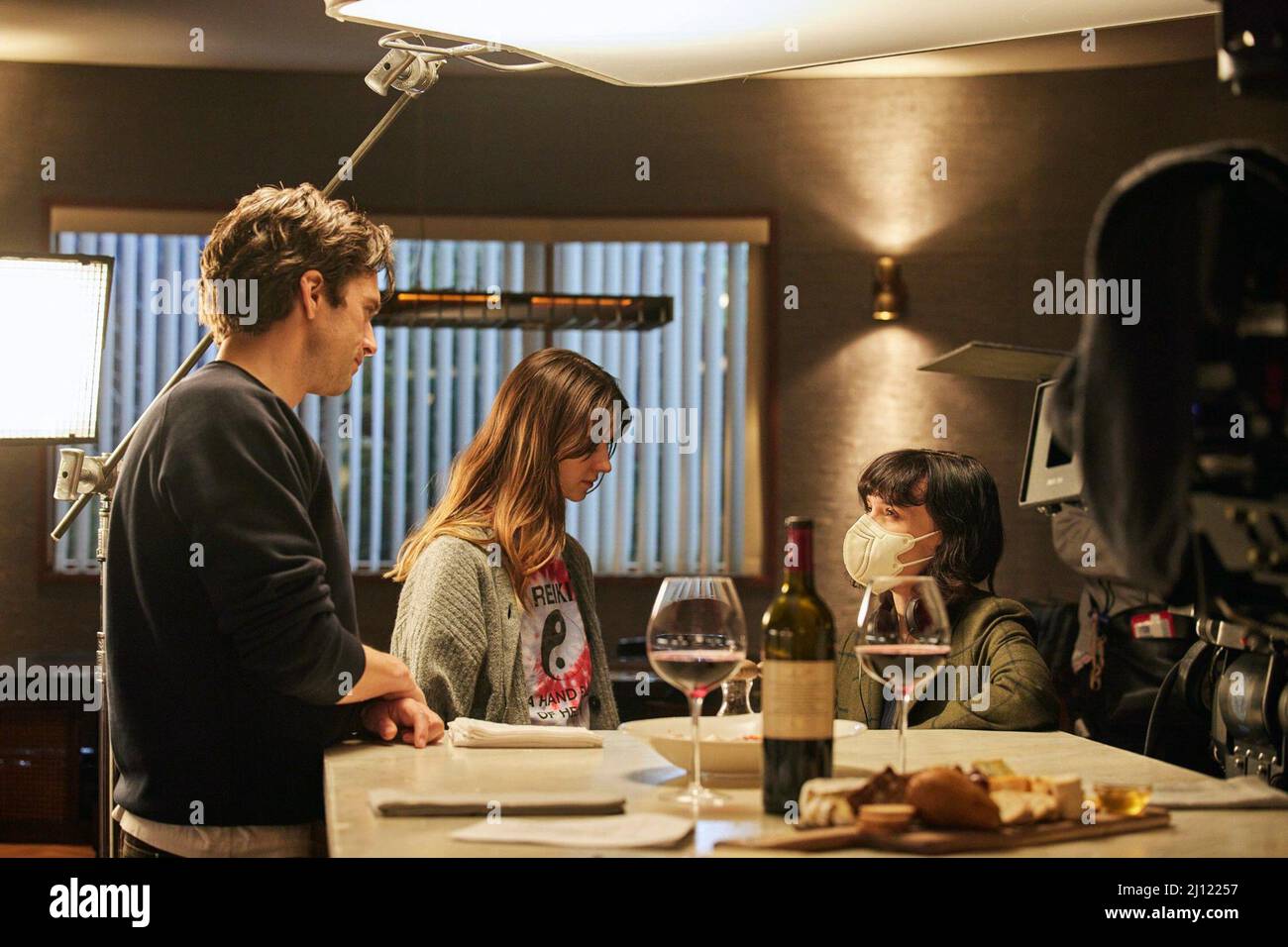 FRESH, from left: Sebastian Stan, Daisy Edgar-Jones, director Mimi Cave, on set, 2022. ph ...