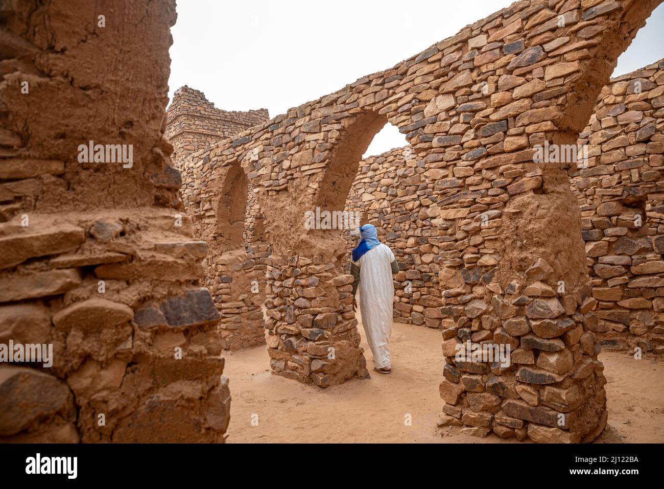 Horseshoe arches of XV century mosque, Ouadane, Mauritania Stock Photo ...