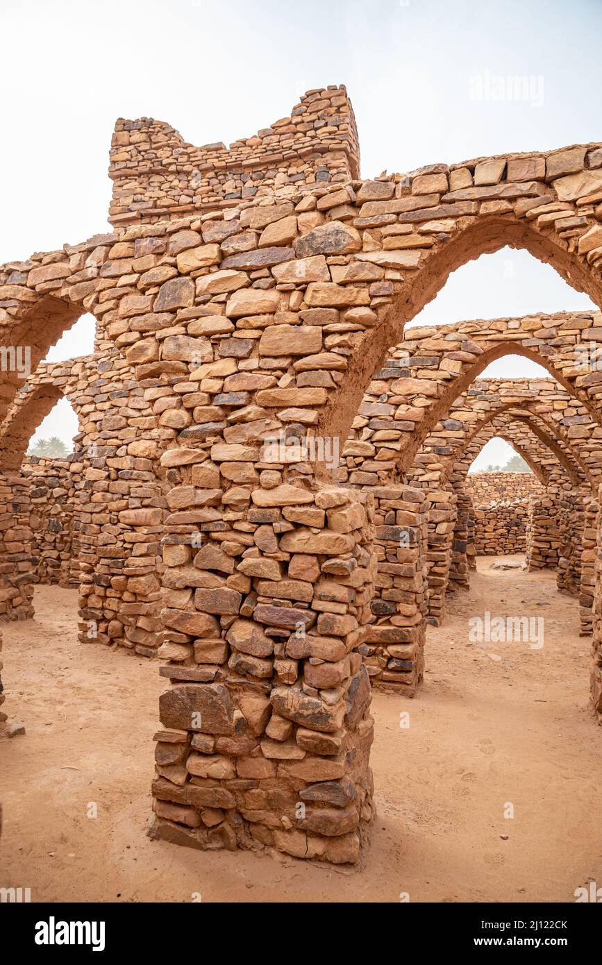 Horseshoe arches of XV century mosque, Ouadane, Mauritania Stock Photo ...
