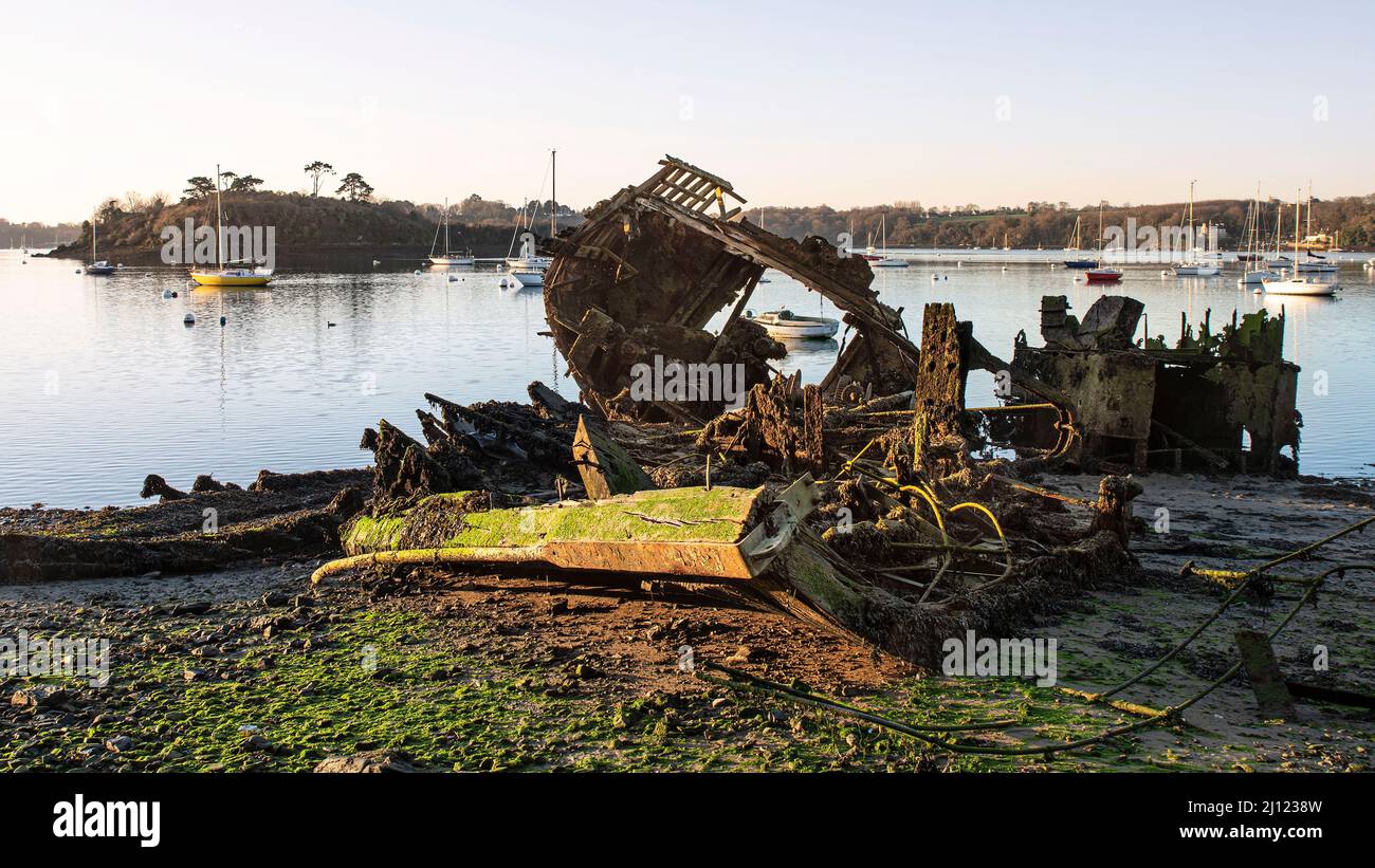 wreck of an old boat on a beach in Brittany, France Stock Photo - Alamy