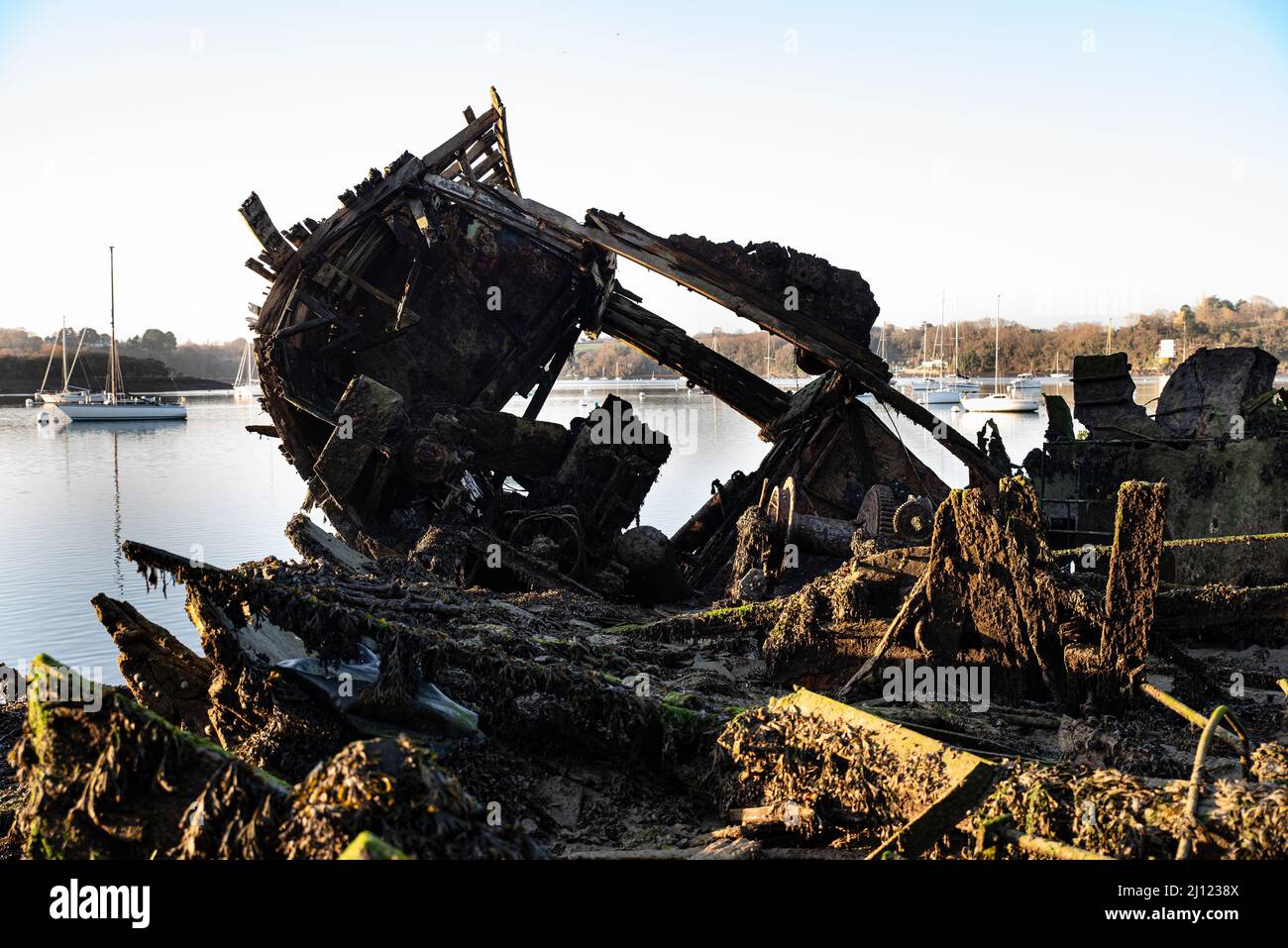 wreck of an old boat on a beach in Brittany, France Stock Photo - Alamy