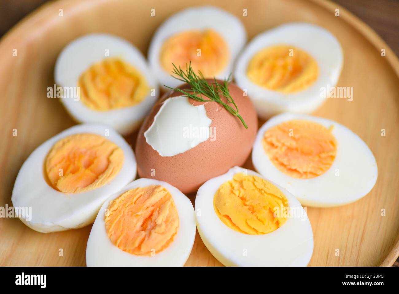 Eggs breakfast, fresh eggs menu food boiled eggs in a wooden plate decorated with leaves green ...