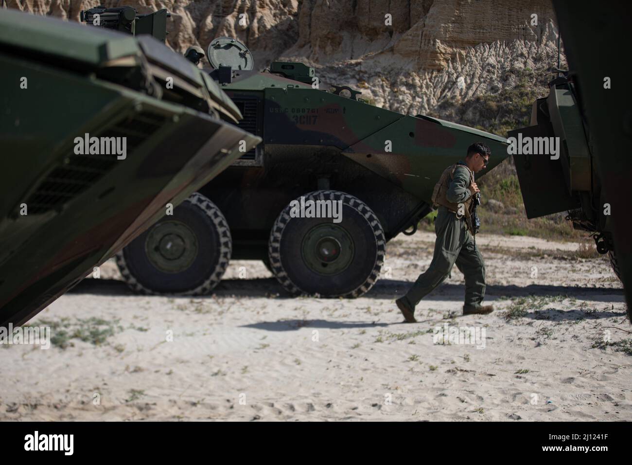 A U.S. Marine with 3d Assault Amphibian Battalion, 1st Marine Division ...