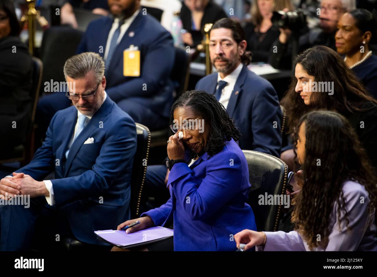 As her husband Patrick Jackson, left, looks on, Judge Ketanji Brown ...