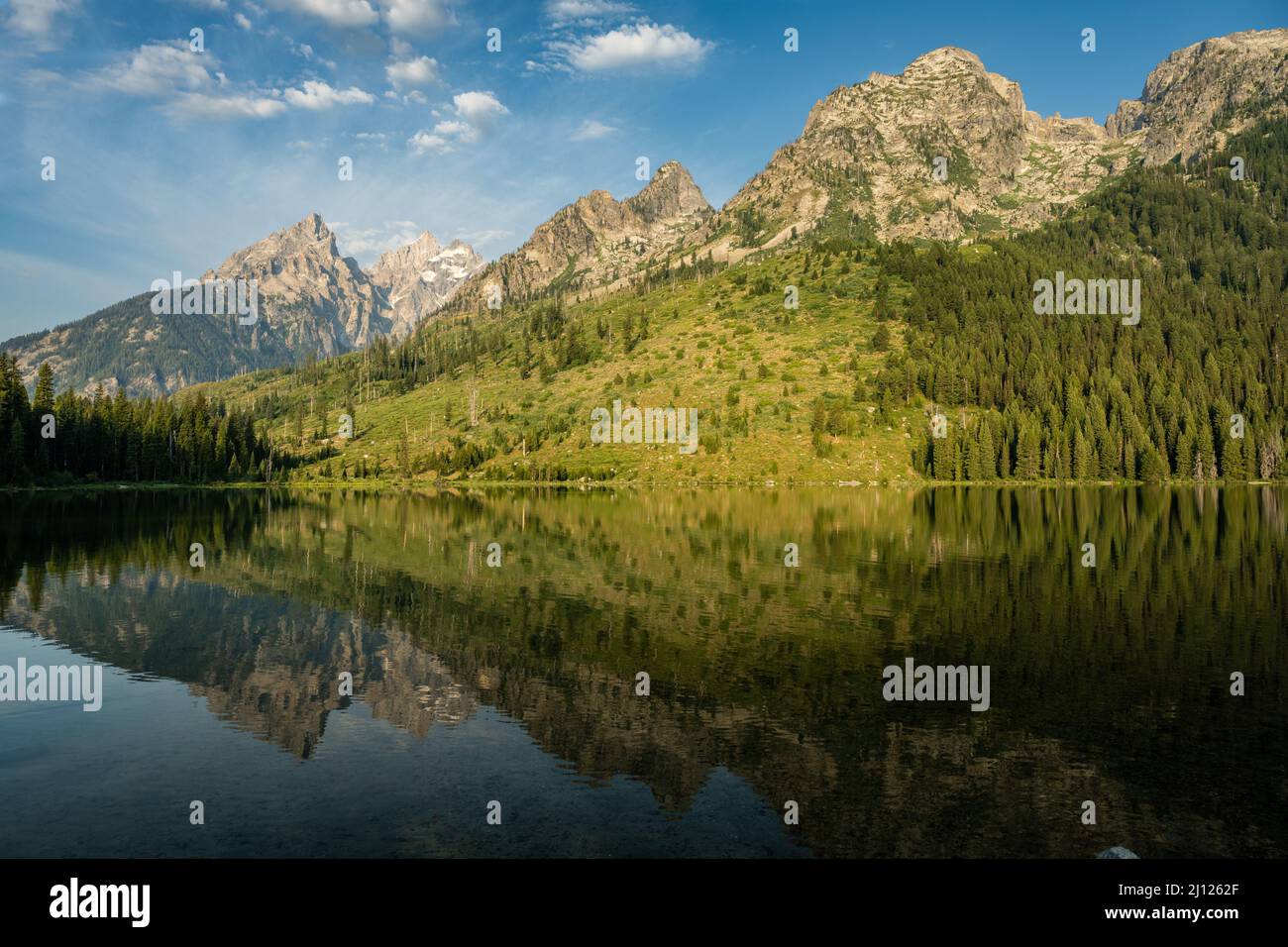 Early Morning Waters in String Lake Below the Tetons Stock Photo - Alamy
