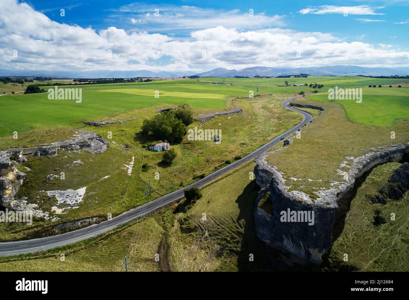 Limestone cliffs and farmland, Island Cliff, North Otago, South Island ...