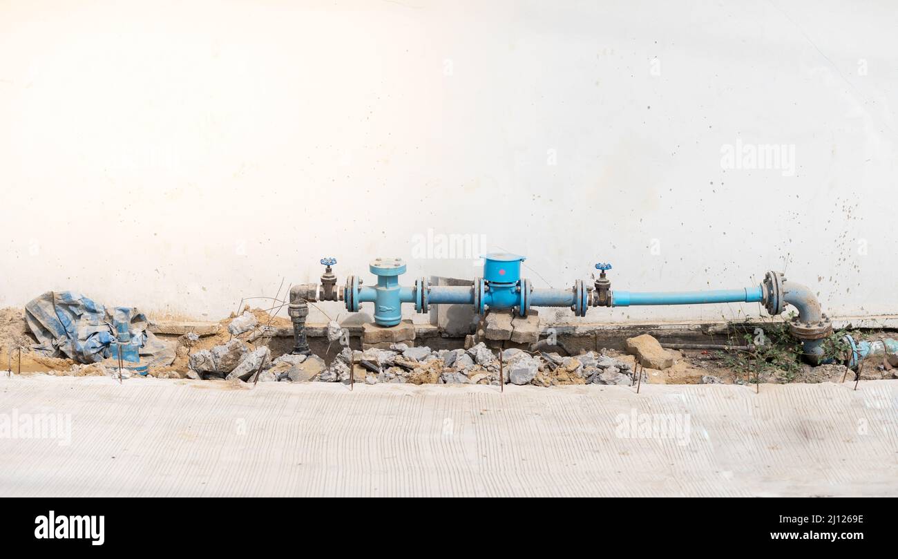 The plumbing is on a concrete base. Large plumbing system supported in ...