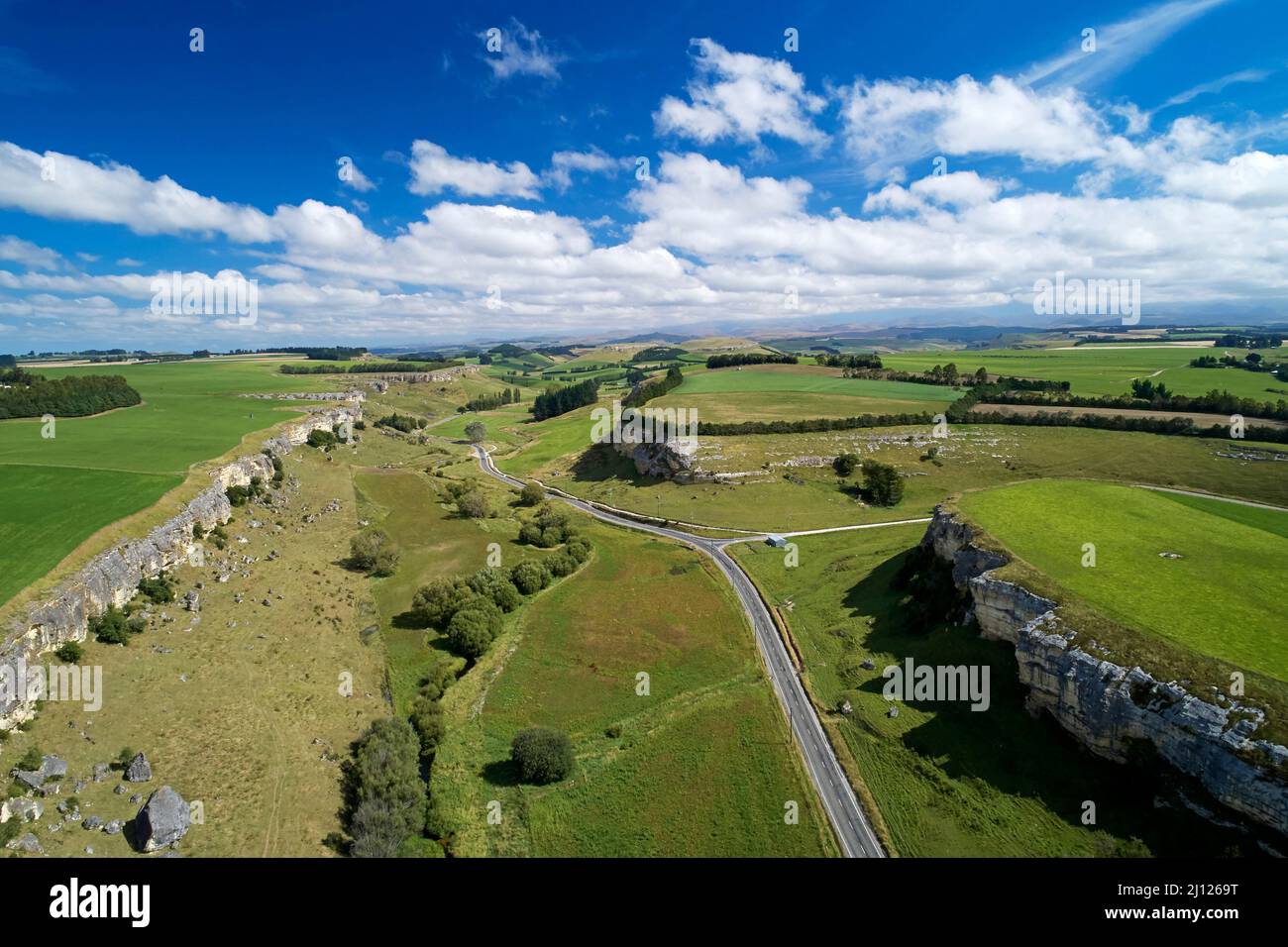 Limestone cliffs and farmland, Island Cliff, North Otago, South Island ...