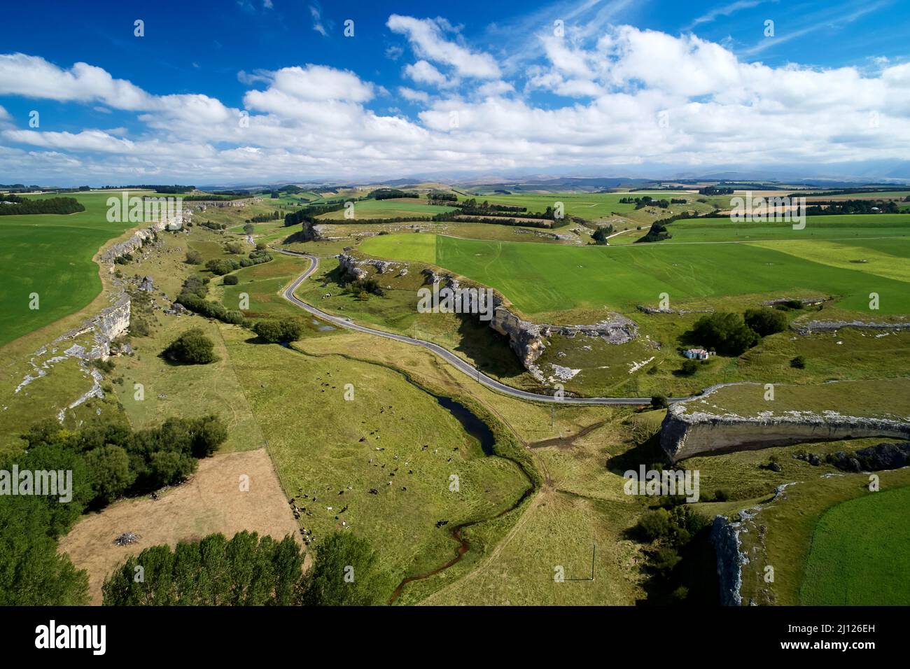 Limestone cliffs and farmland, Island Cliff, North Otago, South Island ...
