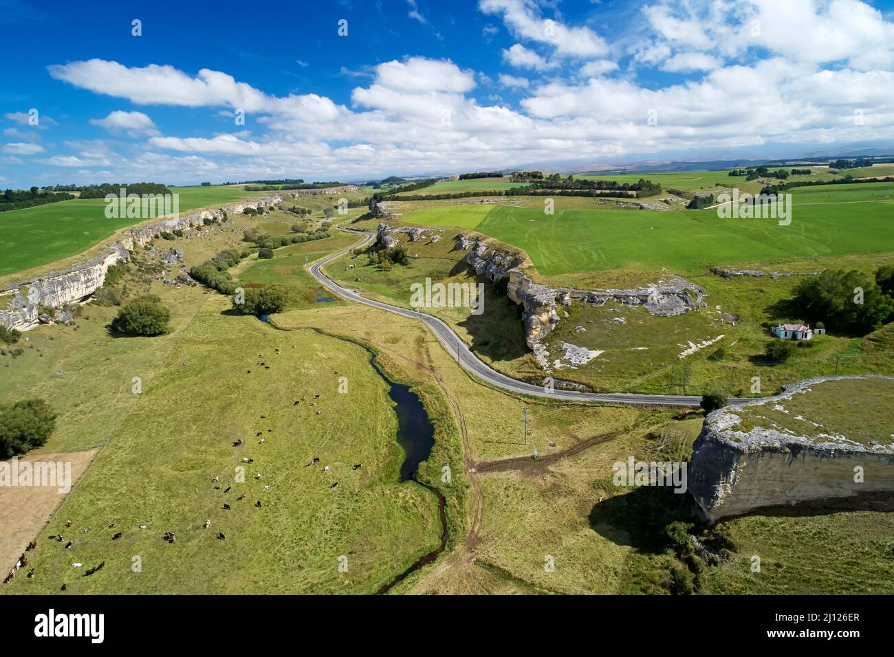 Limestone cliffs and farmland, Island Cliff, North Otago, South Island ...