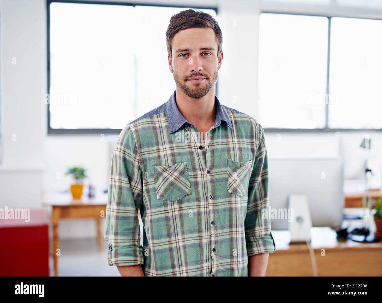 The consummate office professional. Portrait of a stylish young man ...