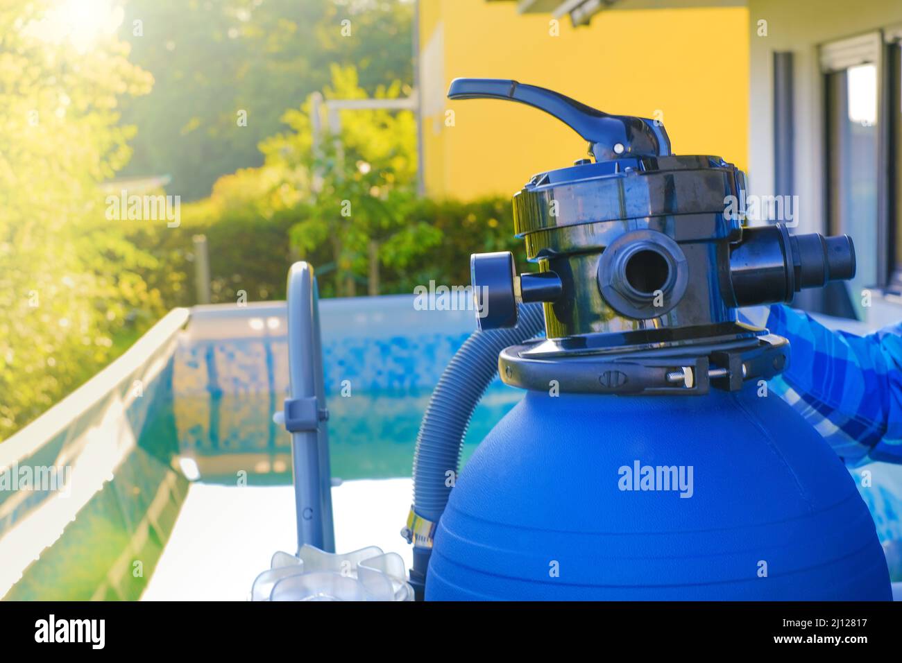 Swimming pool Filter.Swimming pool cleaning equipment. Blue water ...