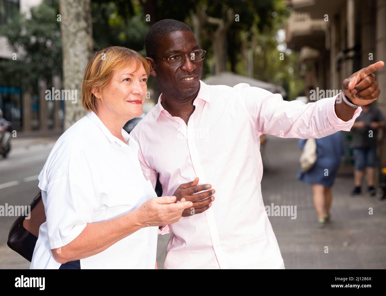 Helping people find their way hi-res stock photography and images - Alamy