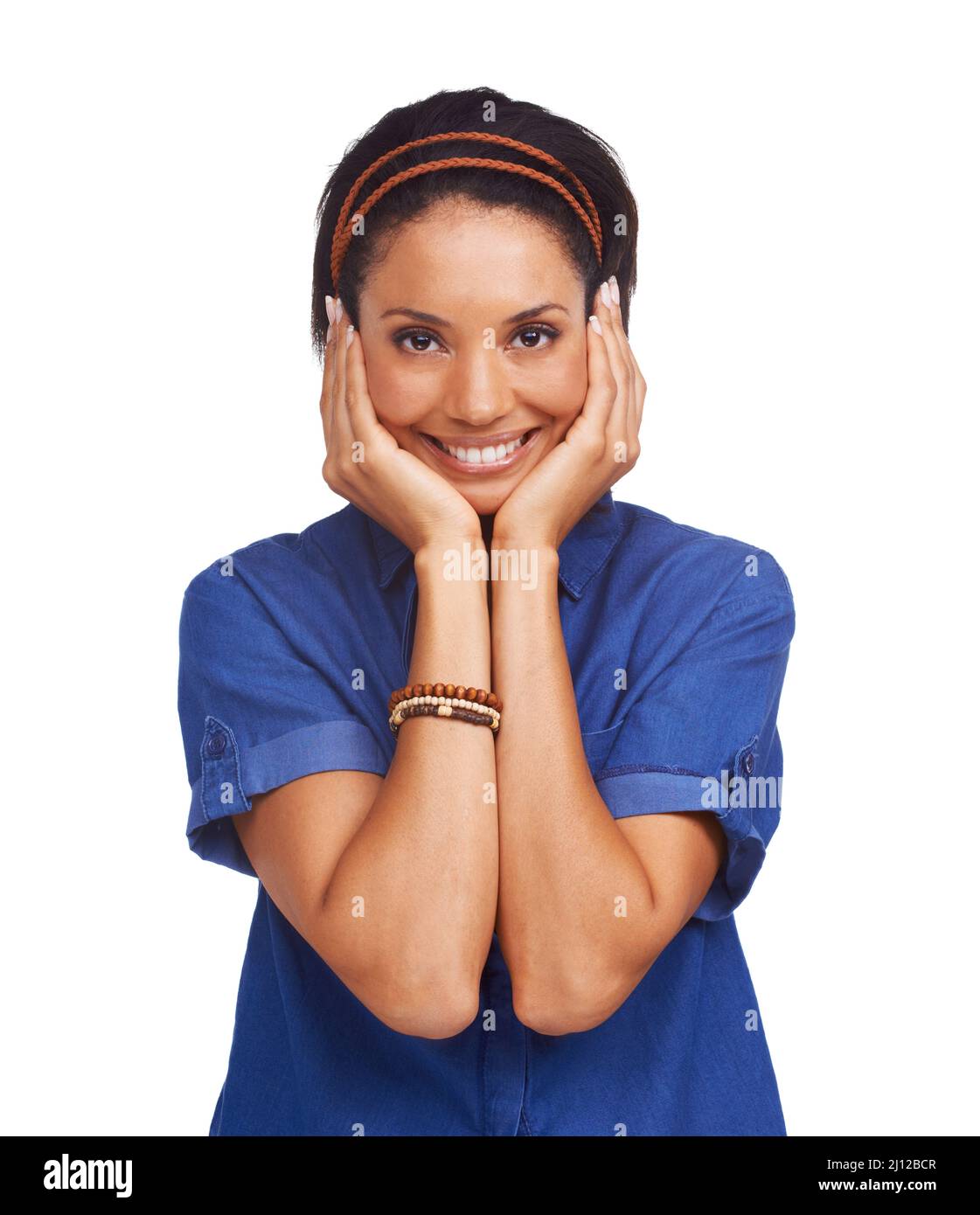 I cant believe it. A nervously excited young woman with her hands on ...