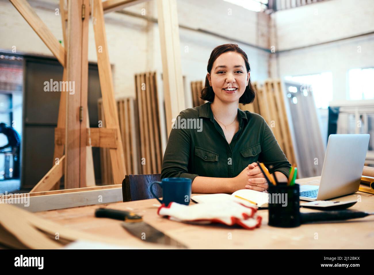 We trim wood into beautiful pieces for your home. Cropped shot of a ...