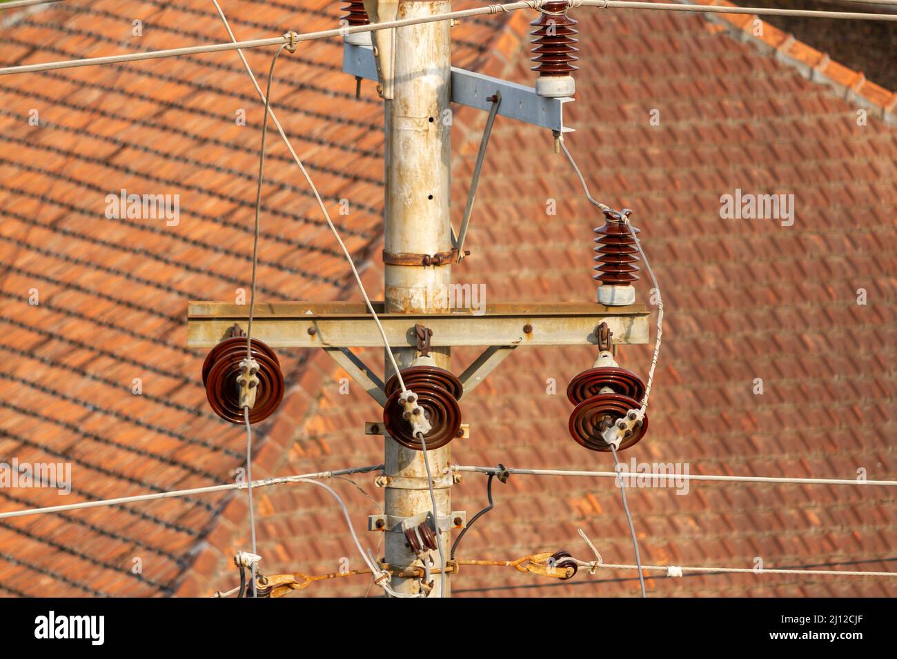 Electrical installation network with concrete poles on the streets side ...