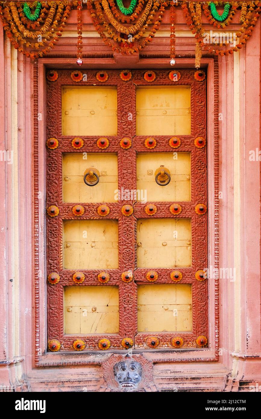 21 March 2022, Pandharpur, India, Old Vintage wooden door on retro wall ...