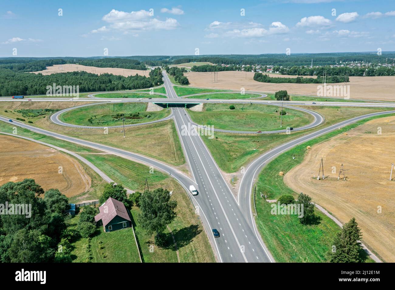 highway road intersection in countryside. aerial view in sunny summer ...