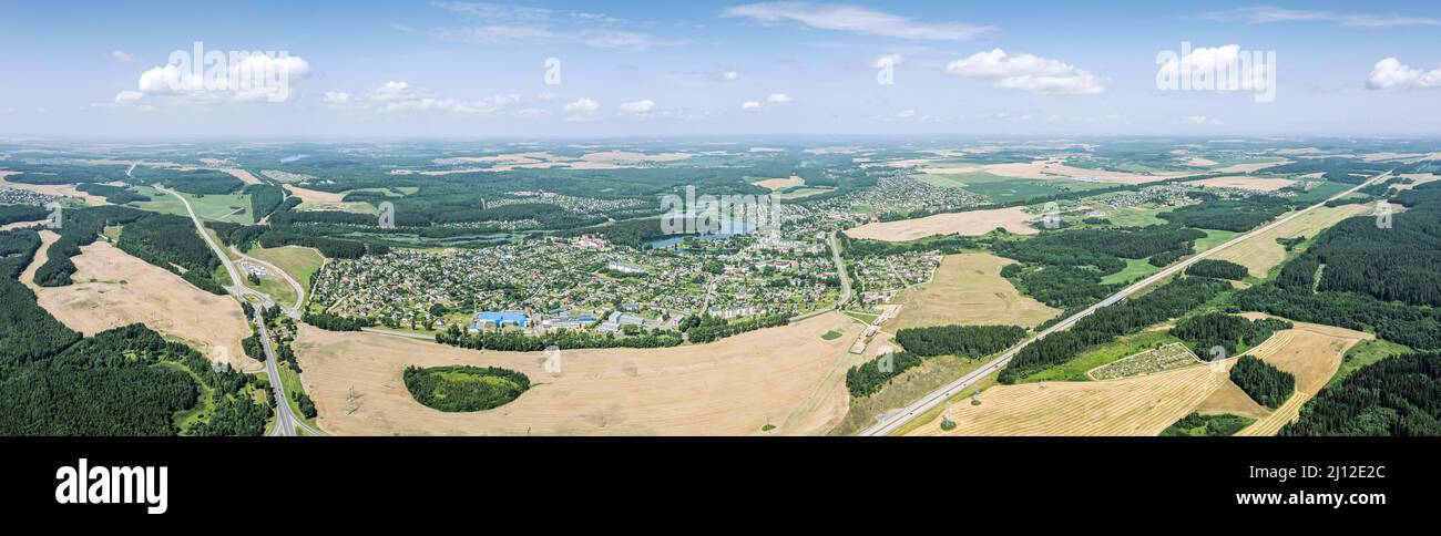 panoramic rural landscape on a hot summer day. aerial view of farm land ...