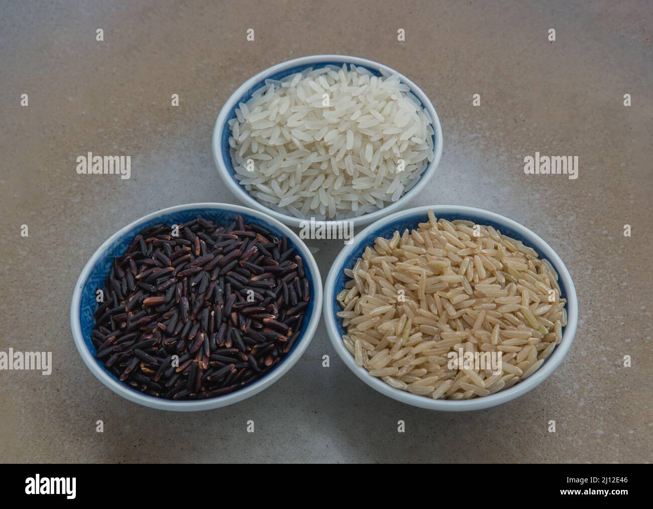 Various types of rice : Brown rice, Jasmine rice, Riceberry ceramic cup ...