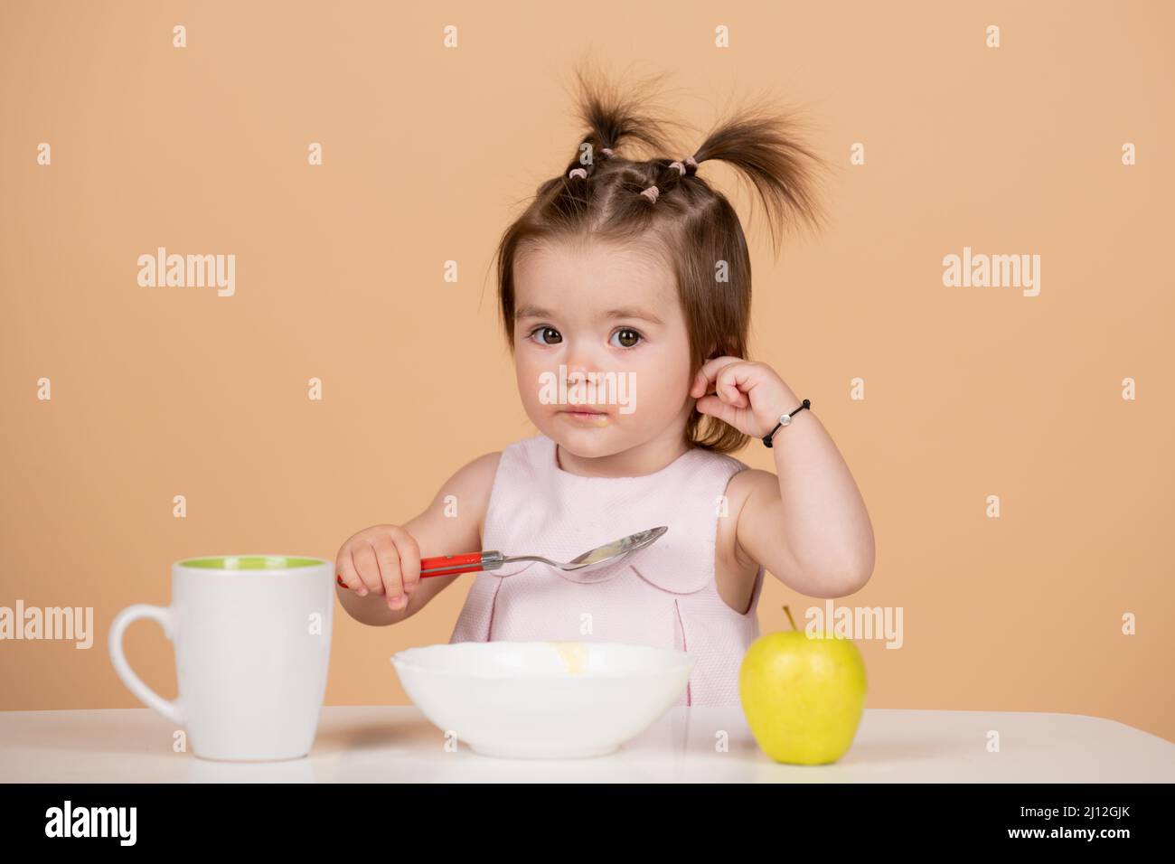 Cute baby food, babies eating. Healthy nutrition for kids. Funny child ...