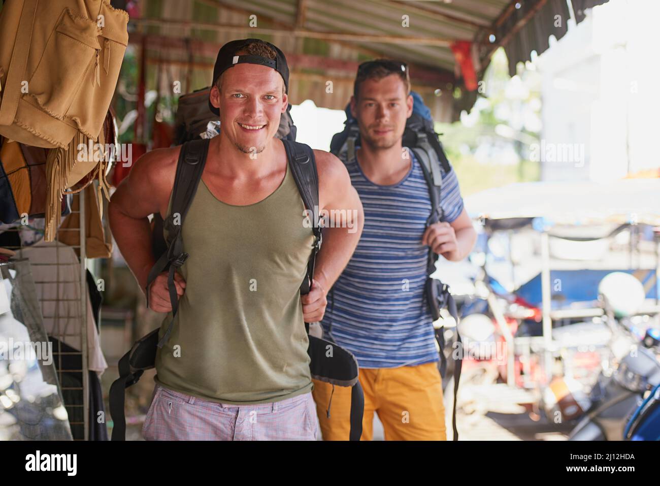 Were off on an adventure. Portrait of two happy travel buddies ...
