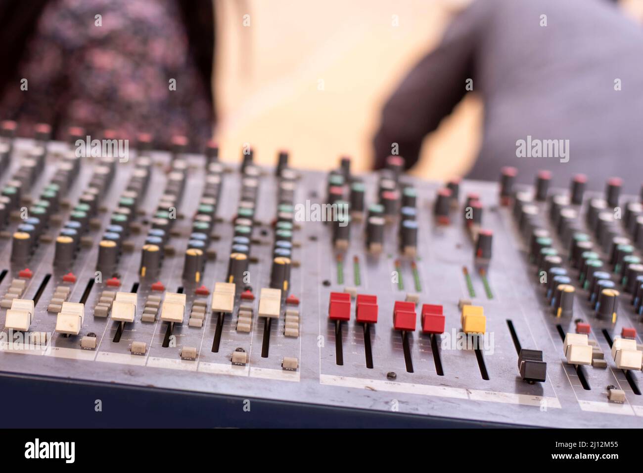 Sound engineer using mixing console to produce a sound track Stock ...