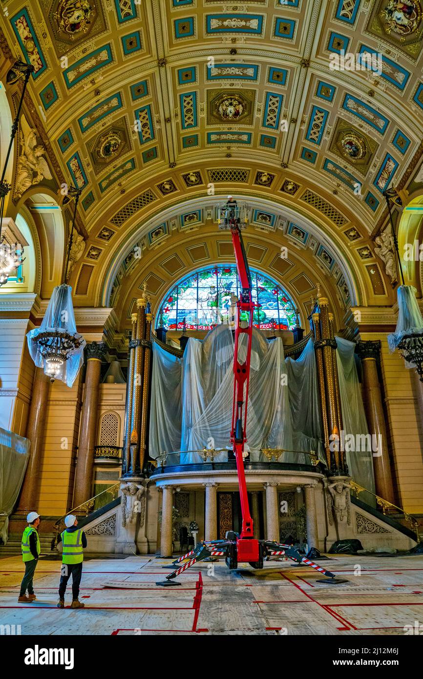 A team of specialists work on the restoration of the 145-foot long, 72 ...