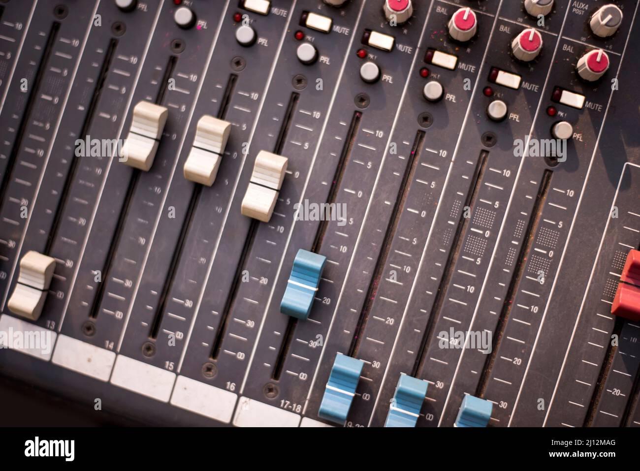 Sound engineer using mixing console to produce a sound track Stock ...