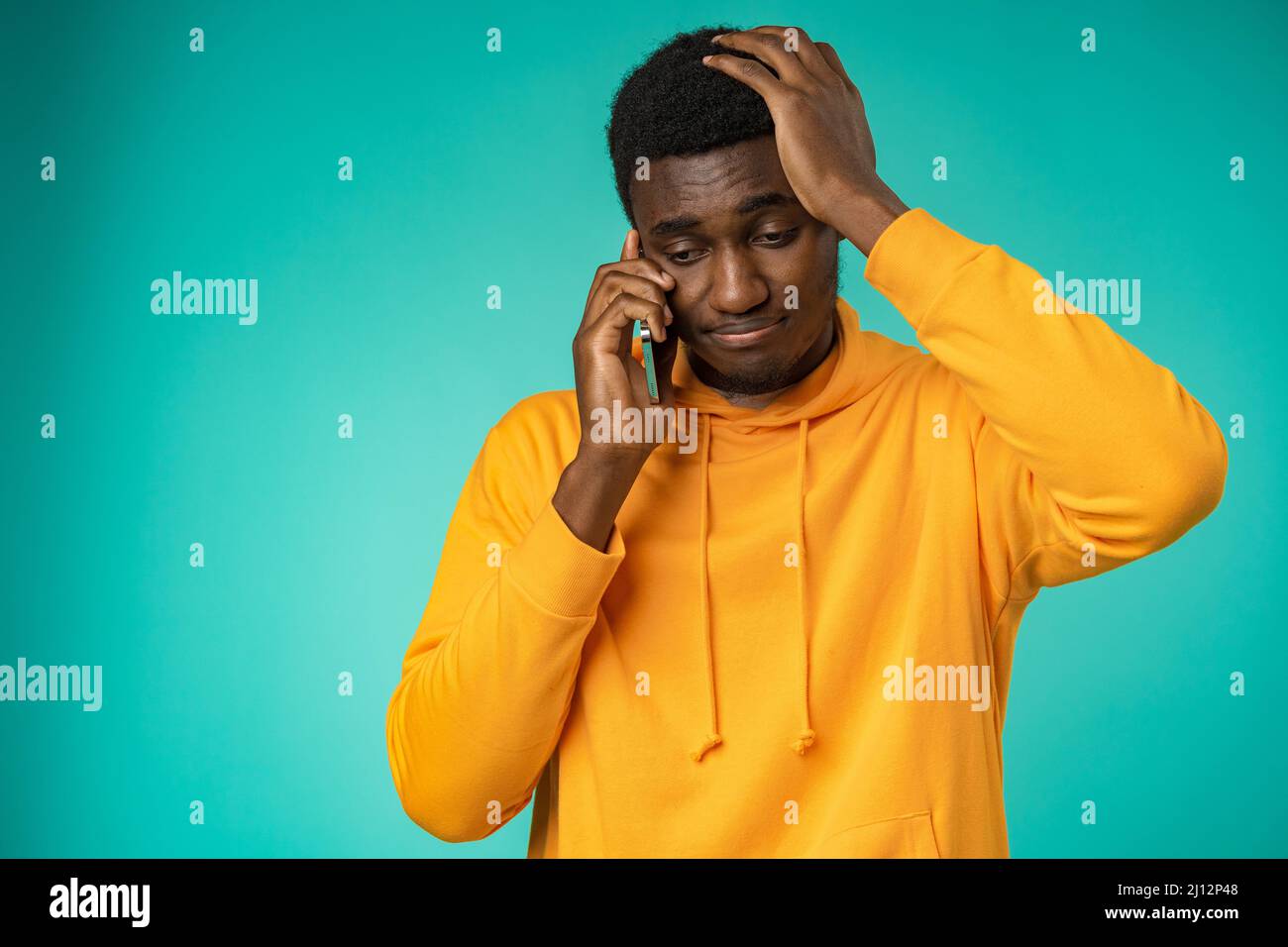 Sad african american man talking hi-res stock photography and images ...
