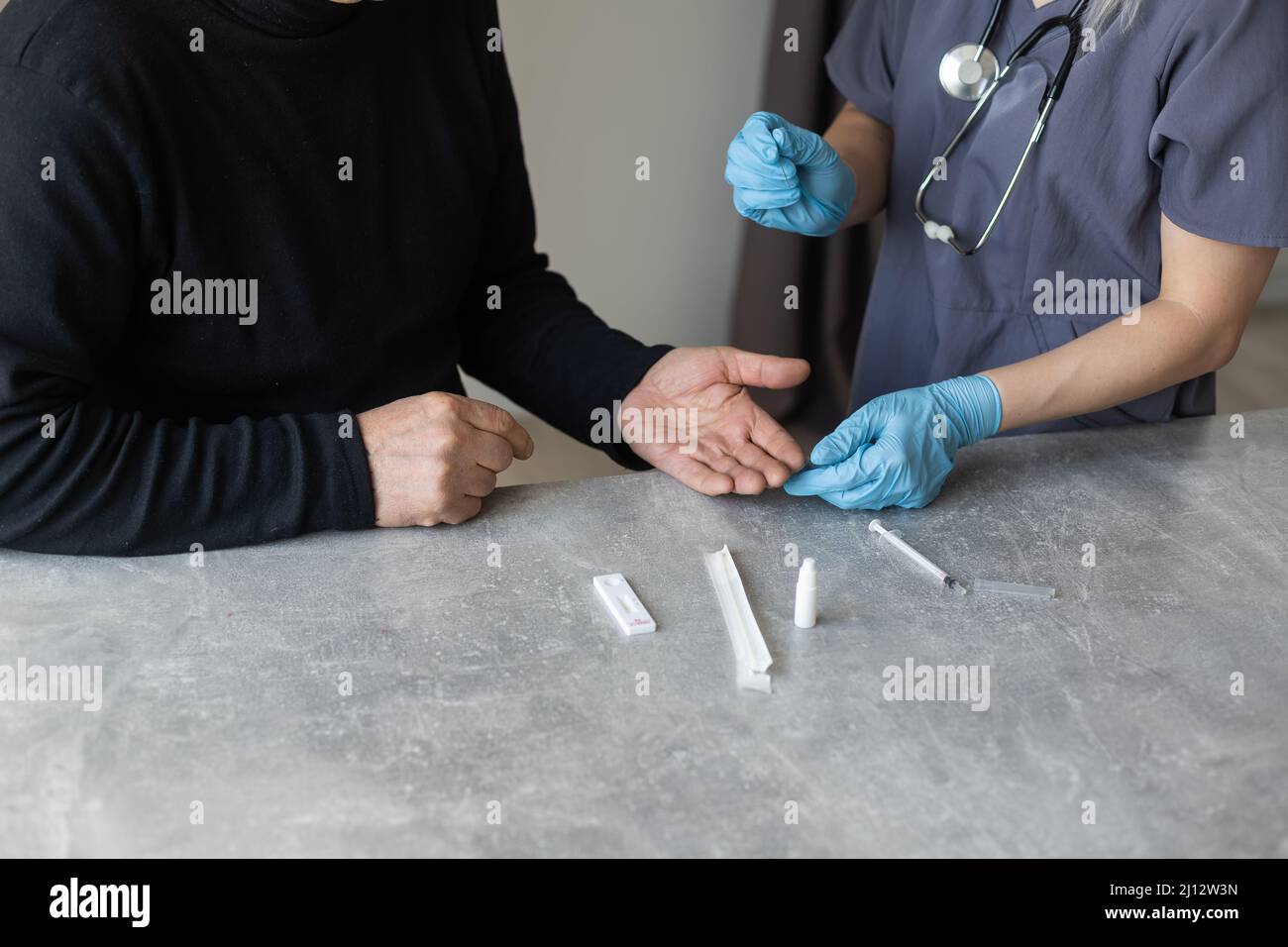 Doctor using nose swab test coronavirus COVID-19 with senior elderly ...