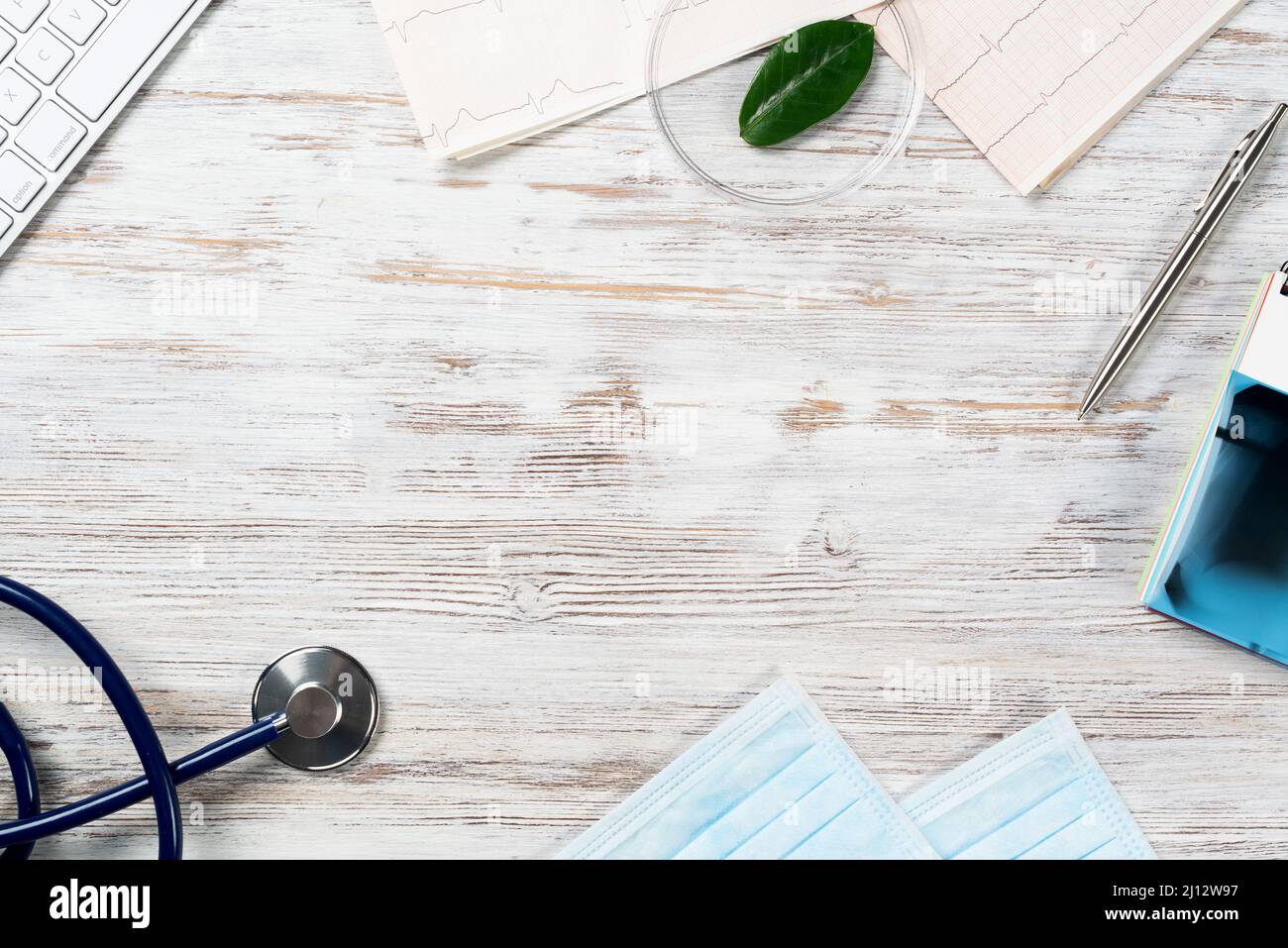 Doctors desktop with medical supplies Stock Photo - Alamy