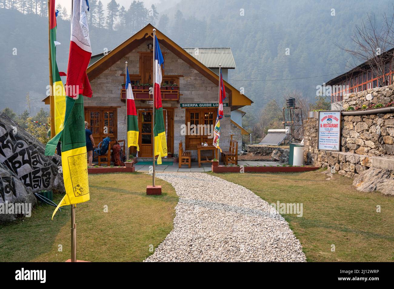 Lukla, Nepal - March 10, 2022: A lodge or teahouse along the trail to ...