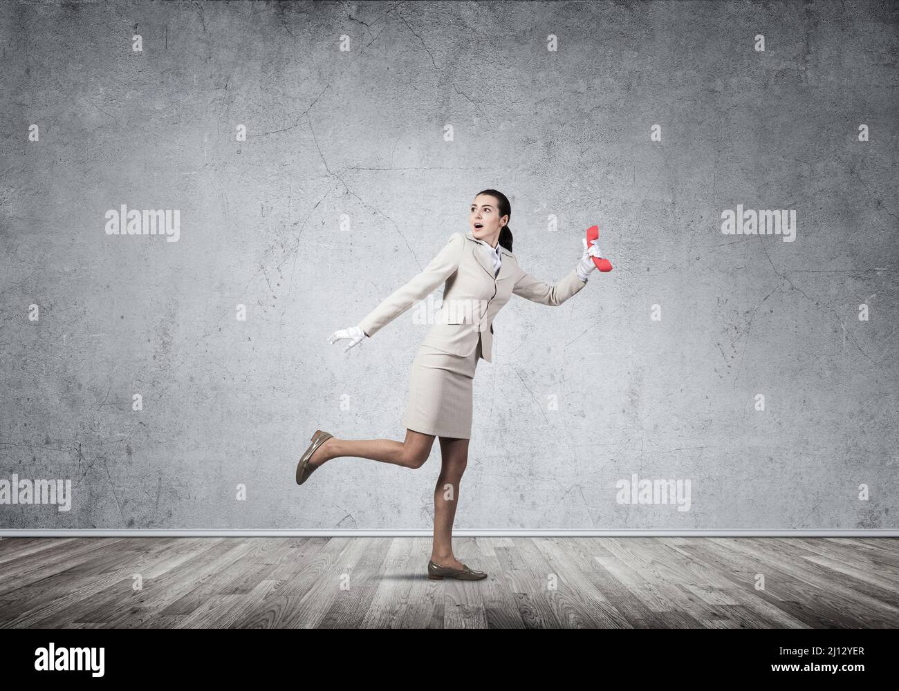Woman runs away from something Stock Photo - Alamy