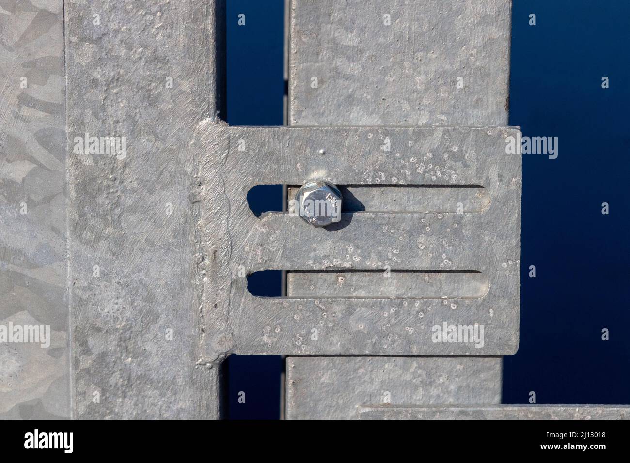 Construction works. Bolting the frame of metal structures Stock Photo ...