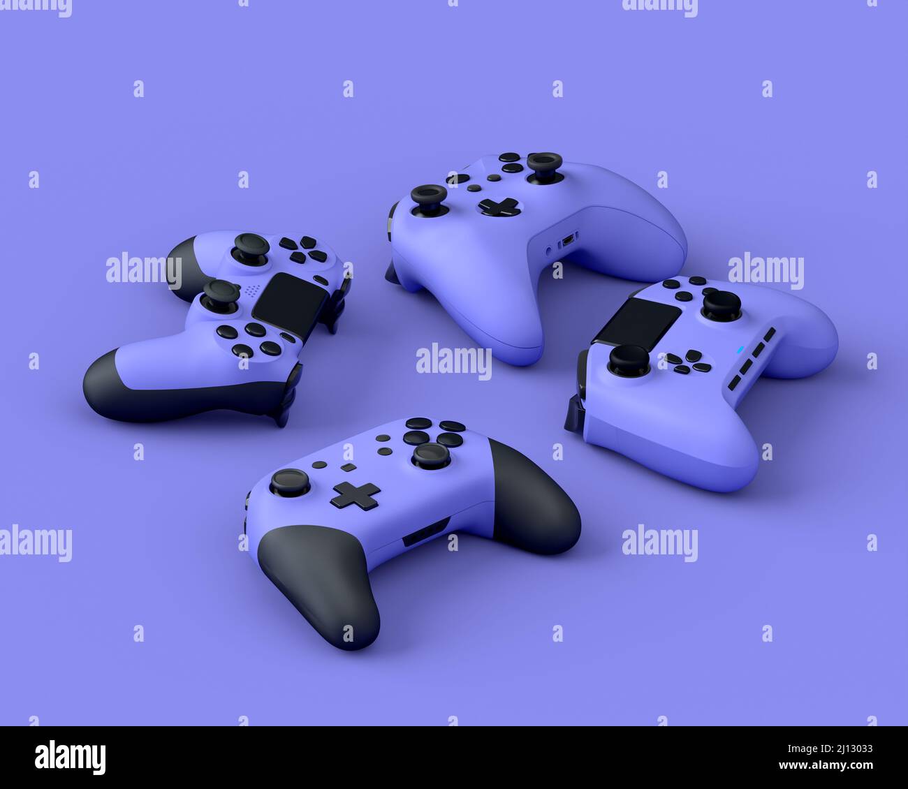 Set of lying gamer joysticks or gamepads on purple background with blur ...