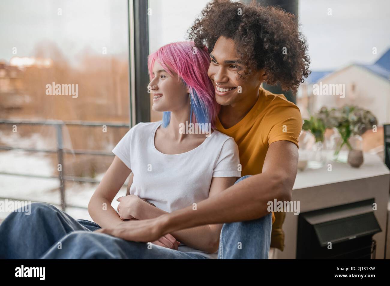 Two People Hugging Each Other