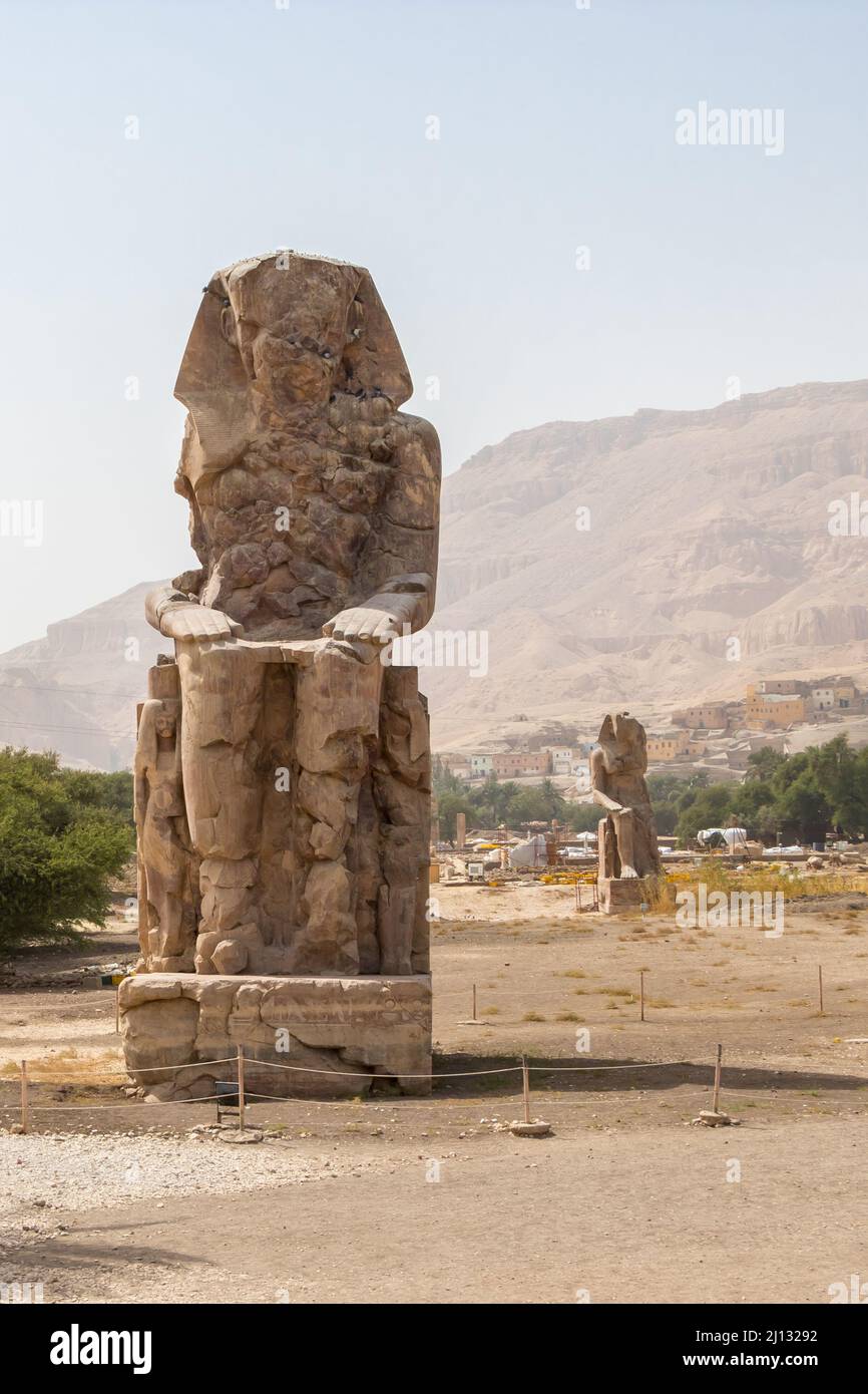 Ancient statues of Colossi on the west bank of the Nile, Luxor, Egypt ...