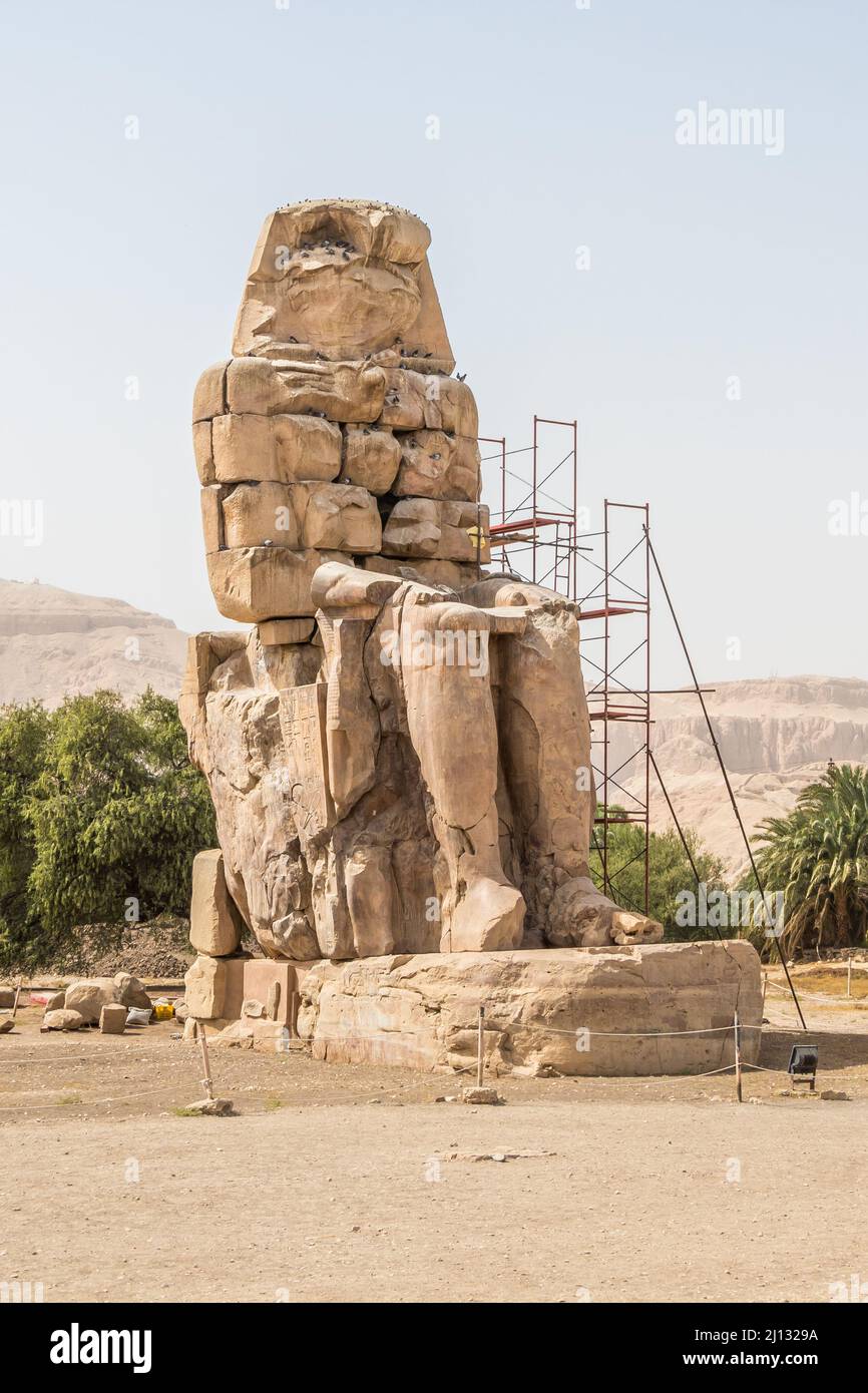 Ancient statue of Colossi of Memnon on the west bank of the Nile, Luxor ...