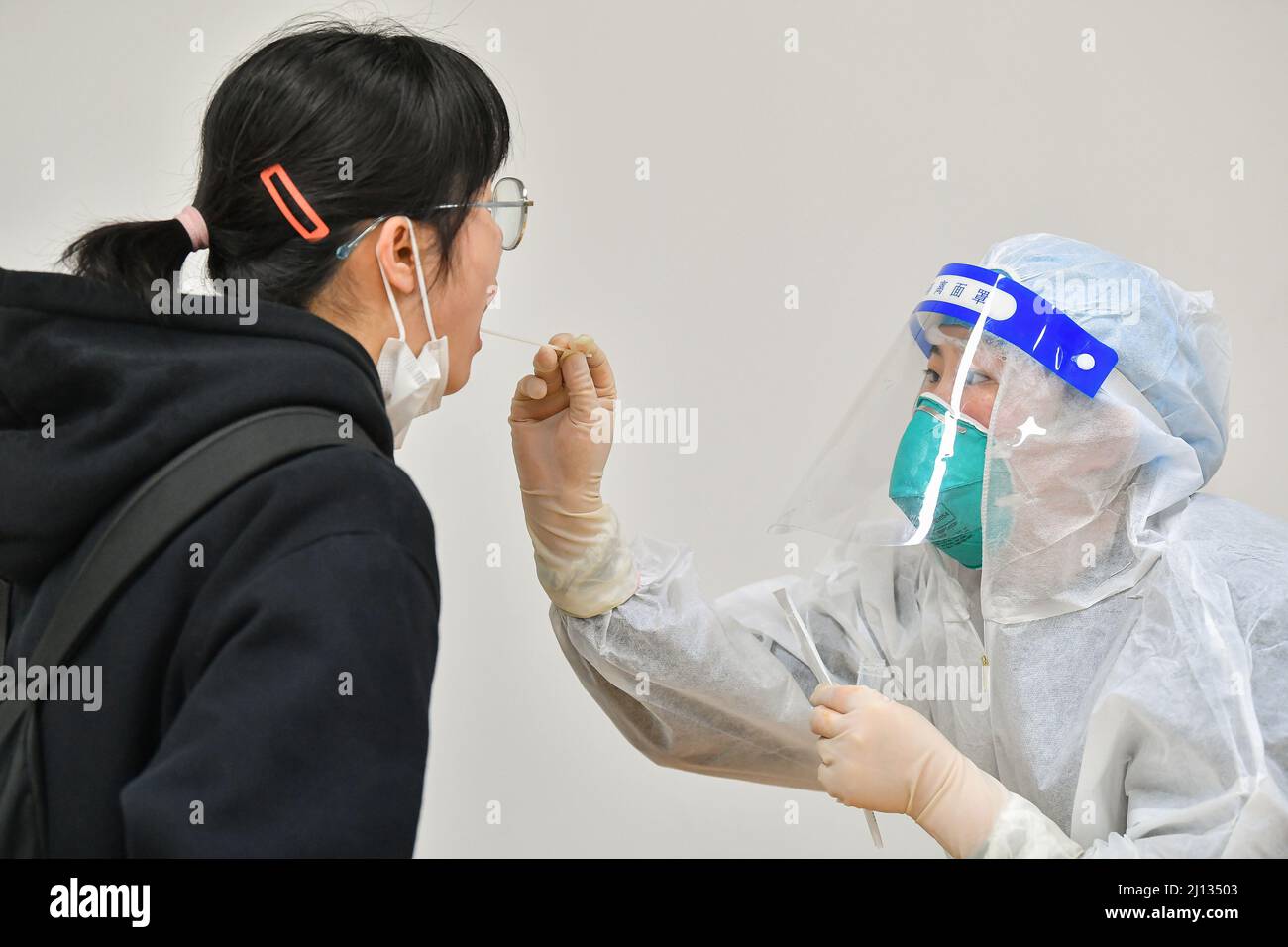 HEFEI, CHINA - MARCH 21, 2022 - A university student takes nucleic acid ...