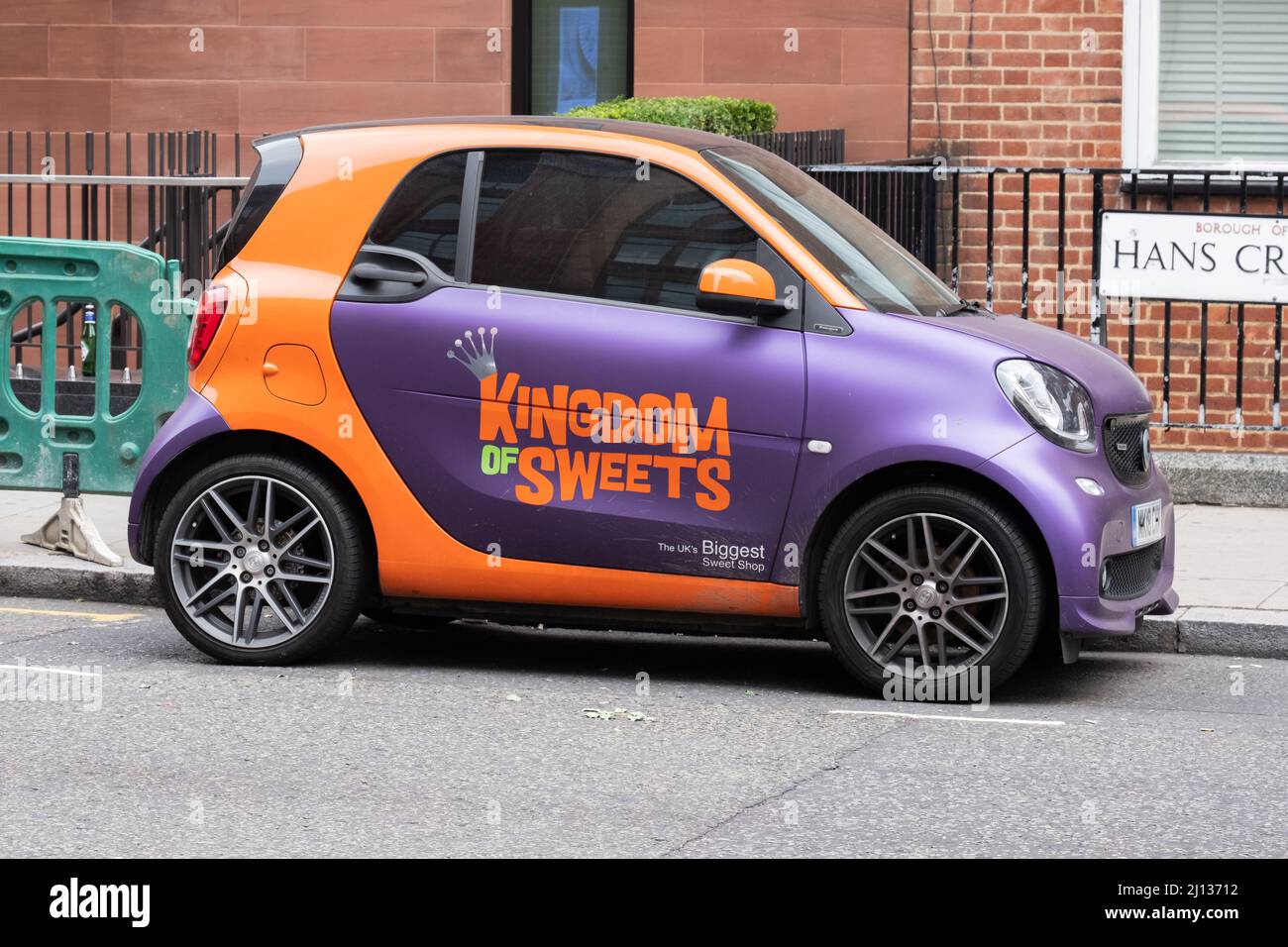 A purple and orange Brabus smart car owned by the Kingdom of Sweets ...