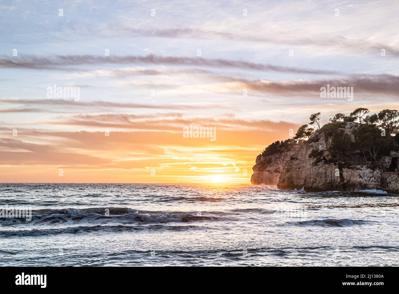 Beautiful sunset views to the horizon from Cala Galdana de Ferrerias ...
