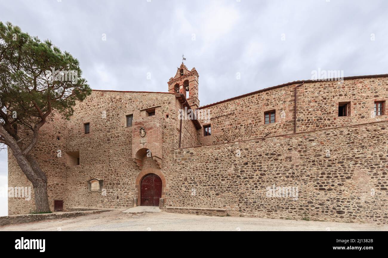 A fortified farm (Il Castelluccio) entrance door with the coat of arms ...