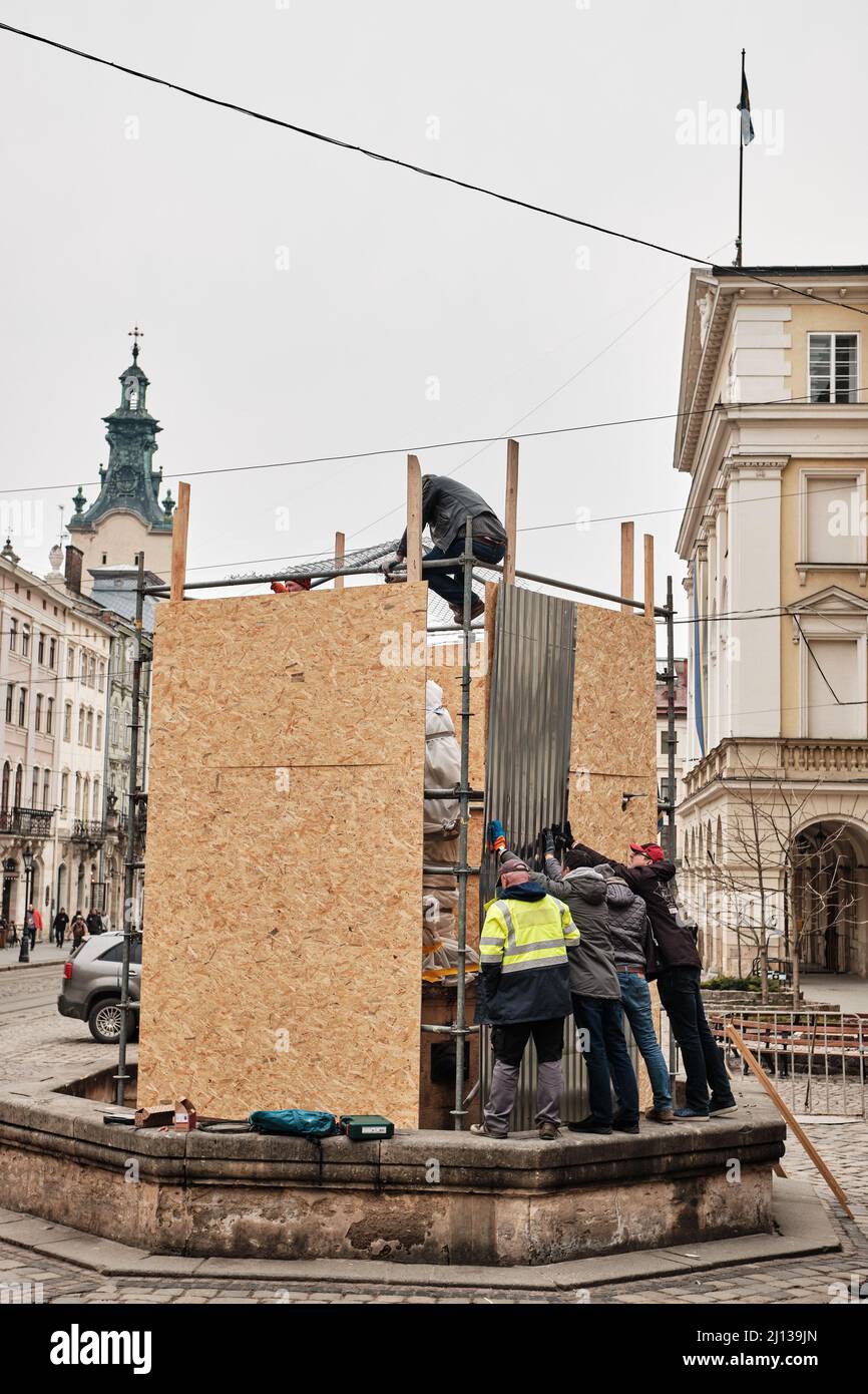 Ukrainians Work to Protect Historic Statues in Lviv. Protective ...