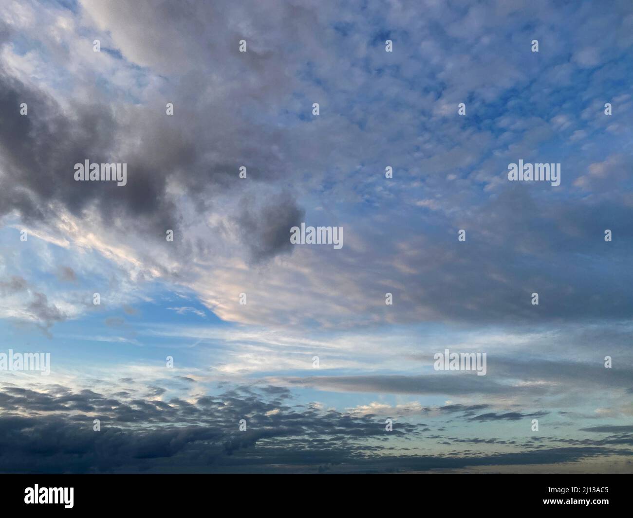 Beautiful sunset sky with a low clouds Stock Photo - Alamy