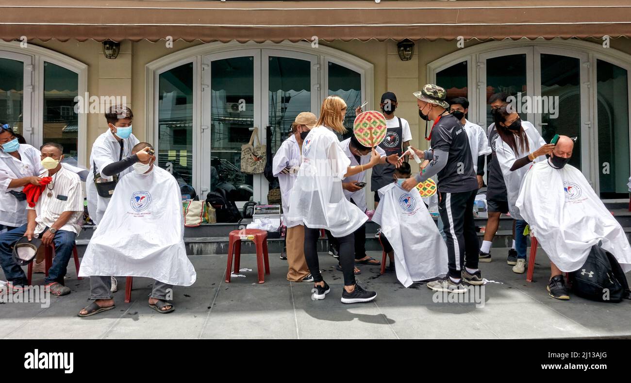 Street haircut. Thailand people getting a haircut on the street ...