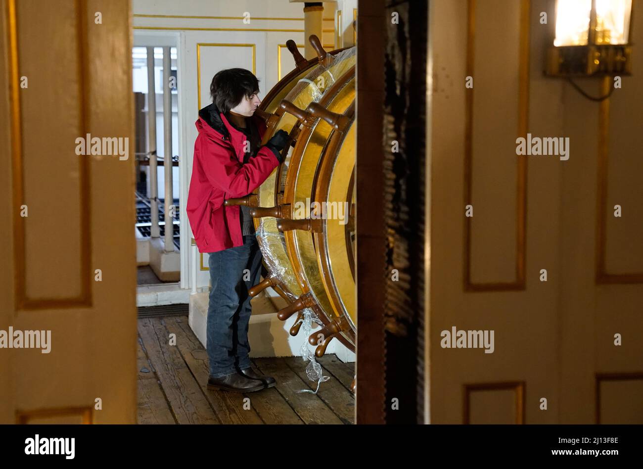 Student conservator Andrew Braund from West Dean College, cleans the ...
