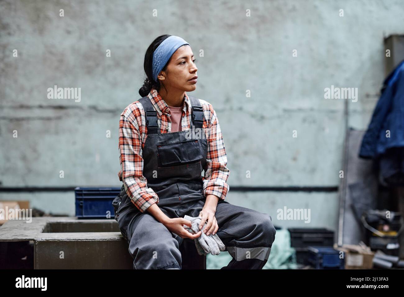 Tired female factory worker taking hi-res stock photography and images ...