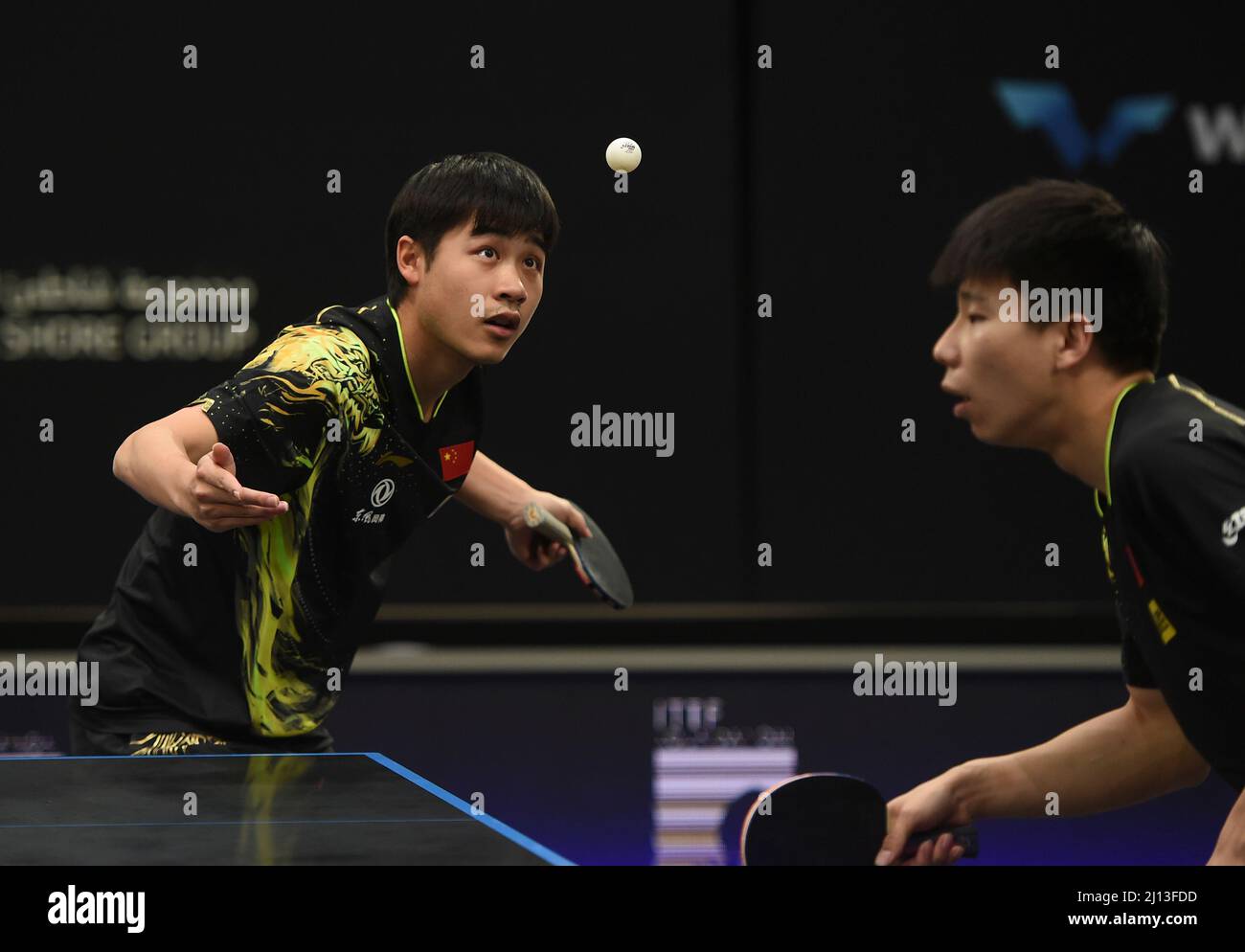 Doha, Qatar. 22nd Mar, 2022. Cao Wei (L)/Xu Yingbin of China compete ...